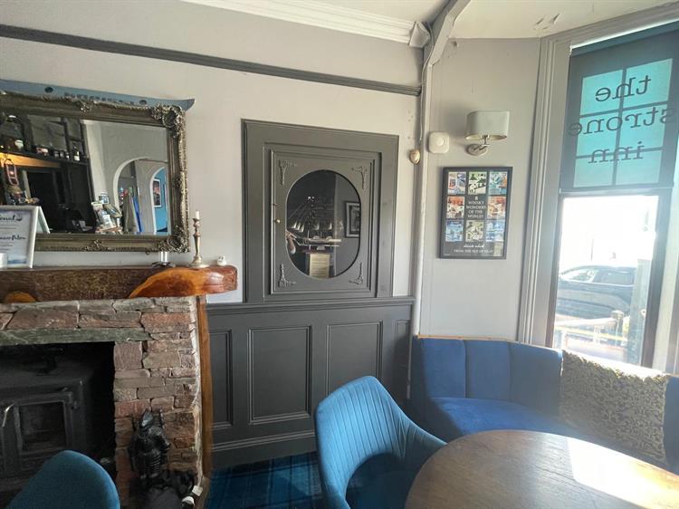 Buy a Charming Village Pub On A Prominent Water-side Plot